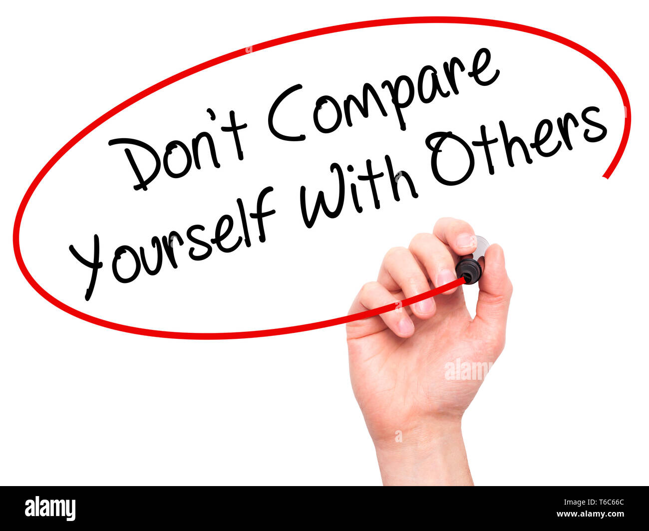 Man Hand writing Don't Compare Yourself With Others with black marker ...