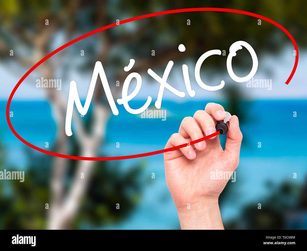 Man Hand writing Mexico (In Spanish) with black marker on visual screen ...