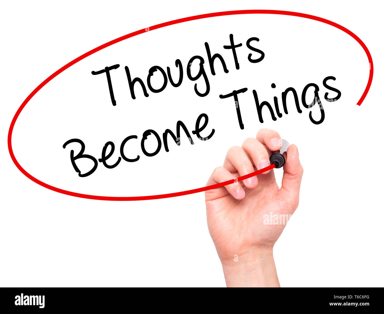 Man Hand writing Thoughts Become Things with black marker on visual ...