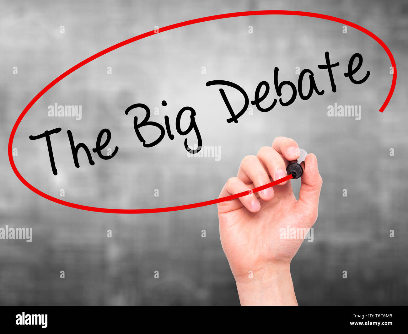 Man Hand writing The Big Debate with black marker on visual screen ...