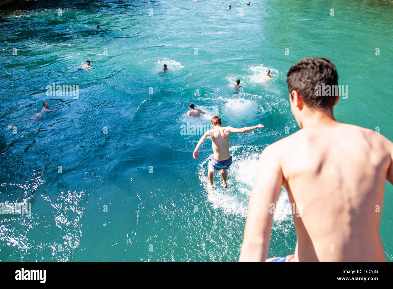Swimming and diving in the river Aare Stock Photo - Alamy