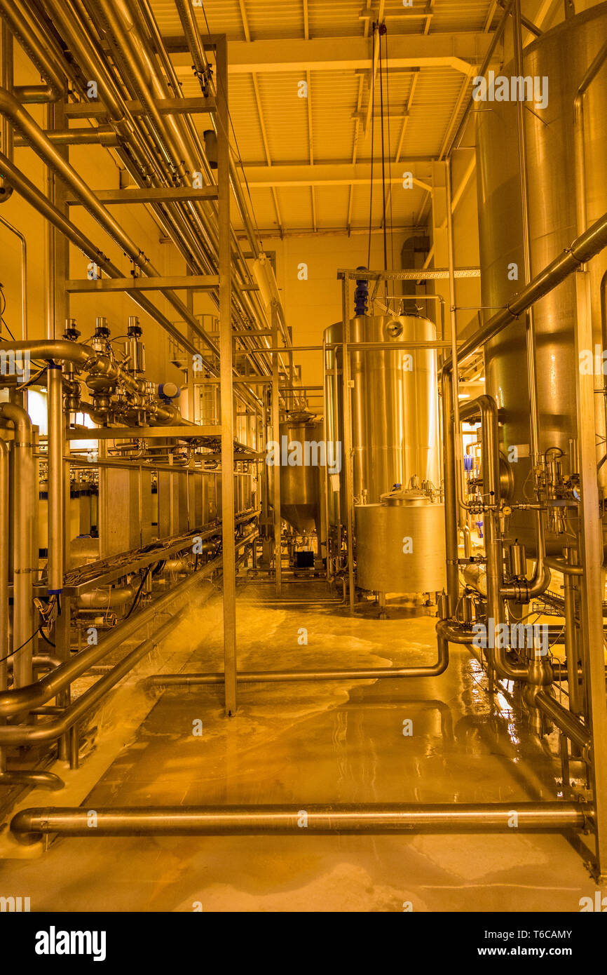 Equipment for production of beer in factory shops Stock Photo - Alamy