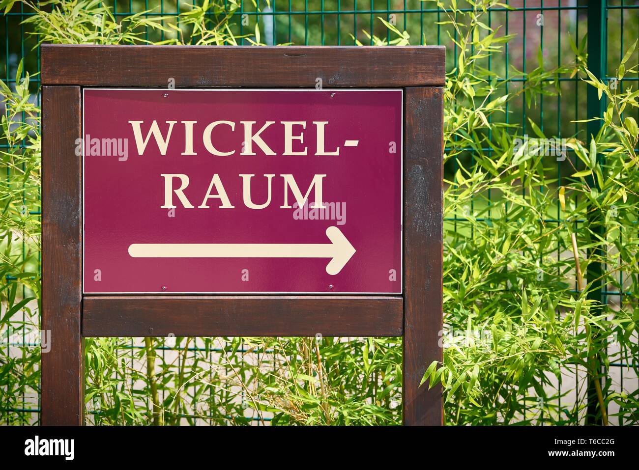 Sign with the inscription Nappy changing room Stock Photo - Alamy