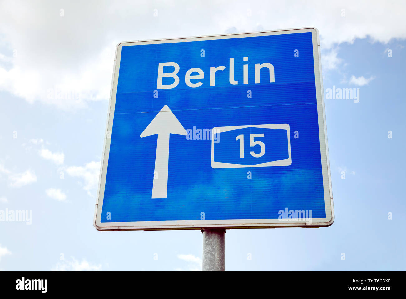 Traffic sign with direction to Berlin Stock Photo - Alamy