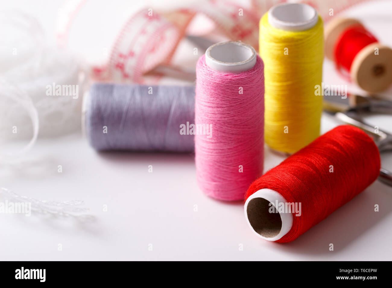Colorful thread spools Stock Photo - Alamy