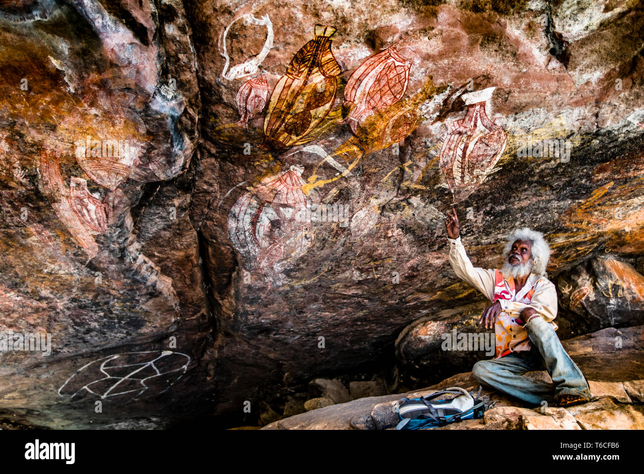 Native Guide explaining Aborigine Rock Art in Long Tom Dreaming ...