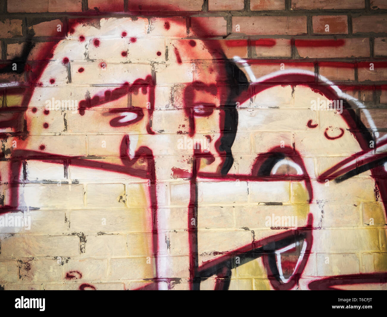 Monster graffiti on a brick wall Stock Photo - Alamy