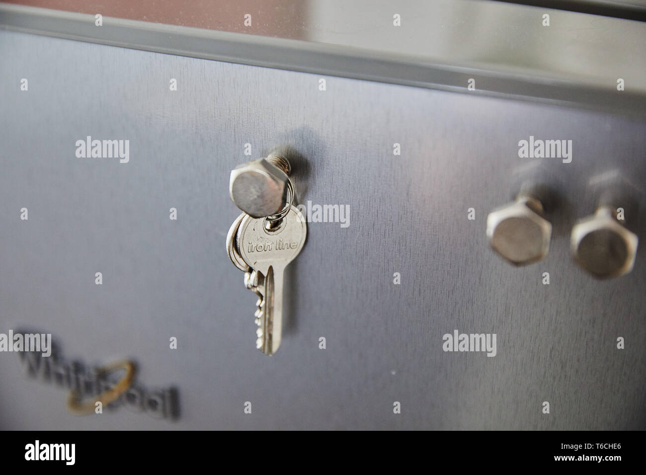 Keys hanging on the silver fridge in the kitchen studio loft apartment ...