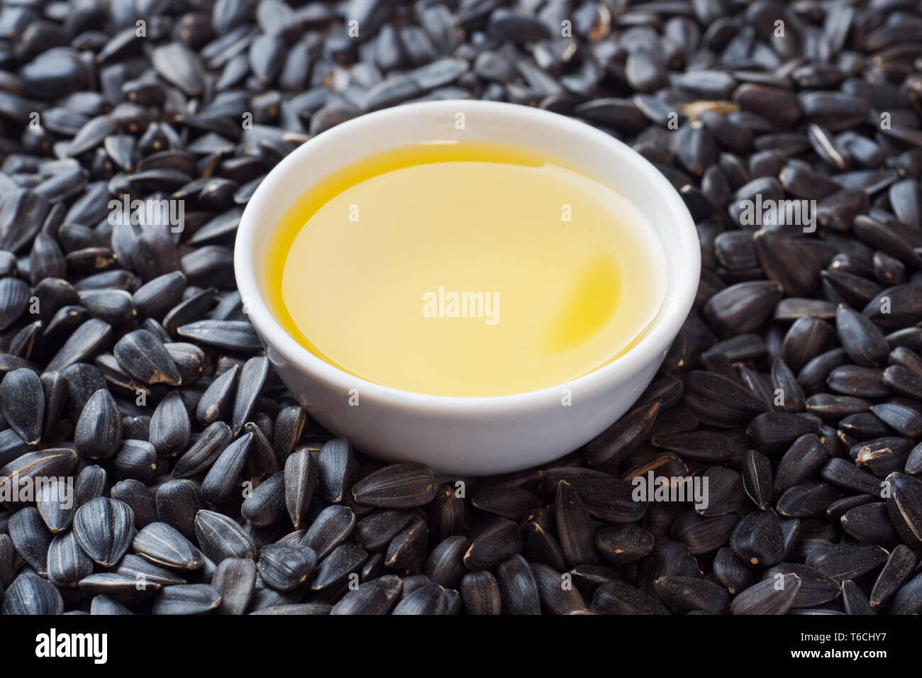 Background of sunflower seeds and vegetable oil Stock Photo - Alamy