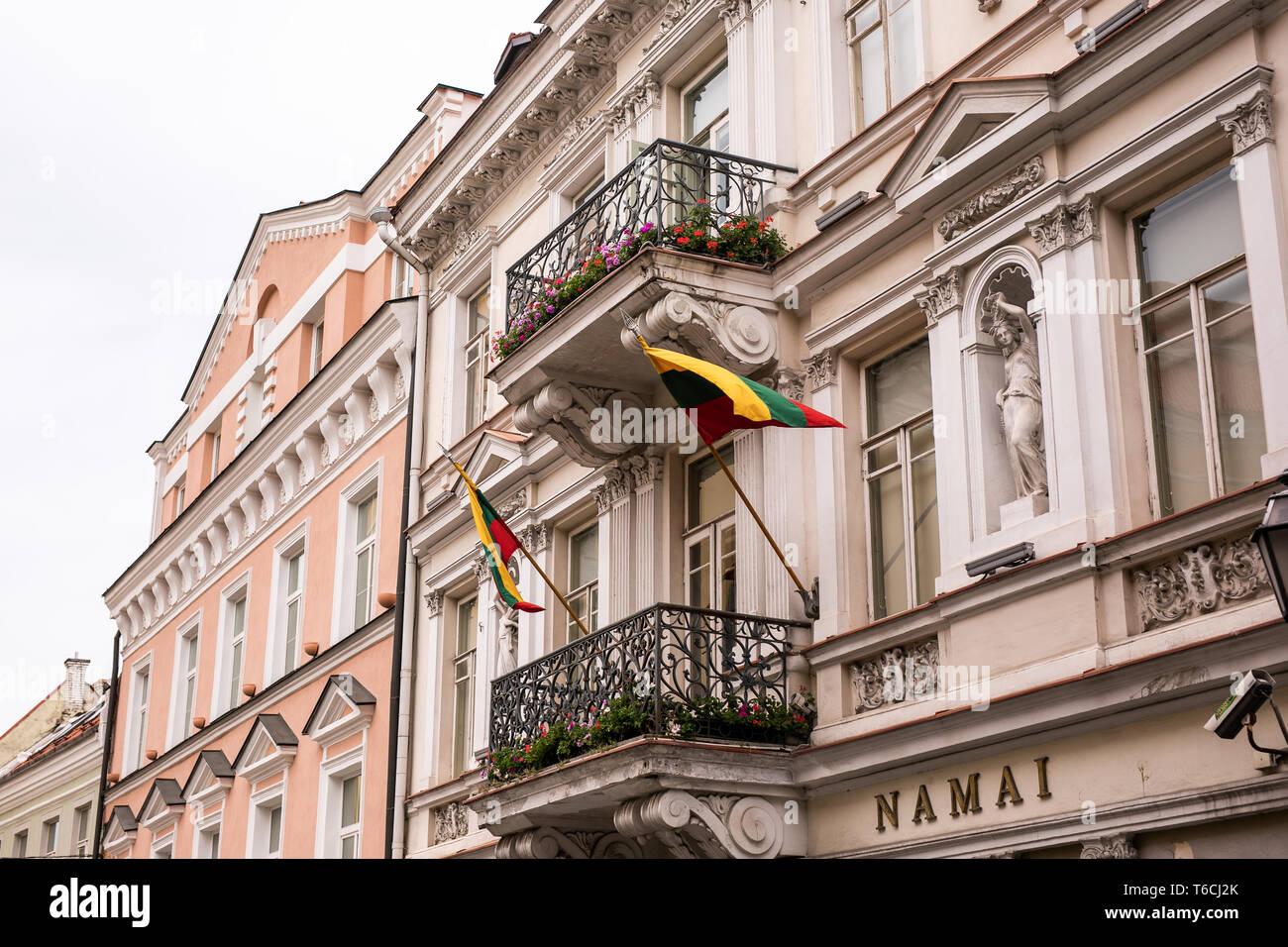 Tourists visit one of the most popular Pilies street of the old town ...