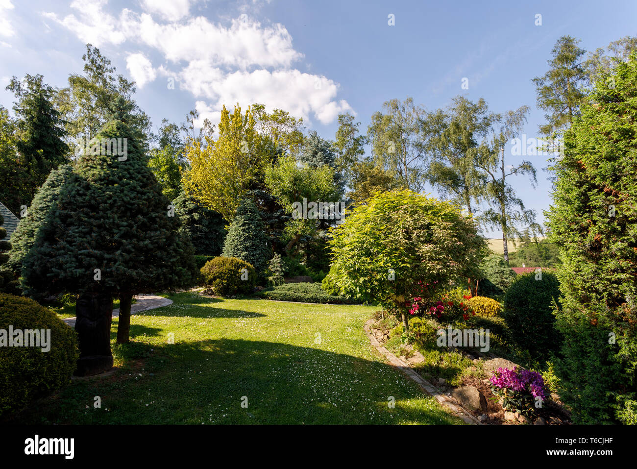 colorful spring garden Stock Photo - Alamy