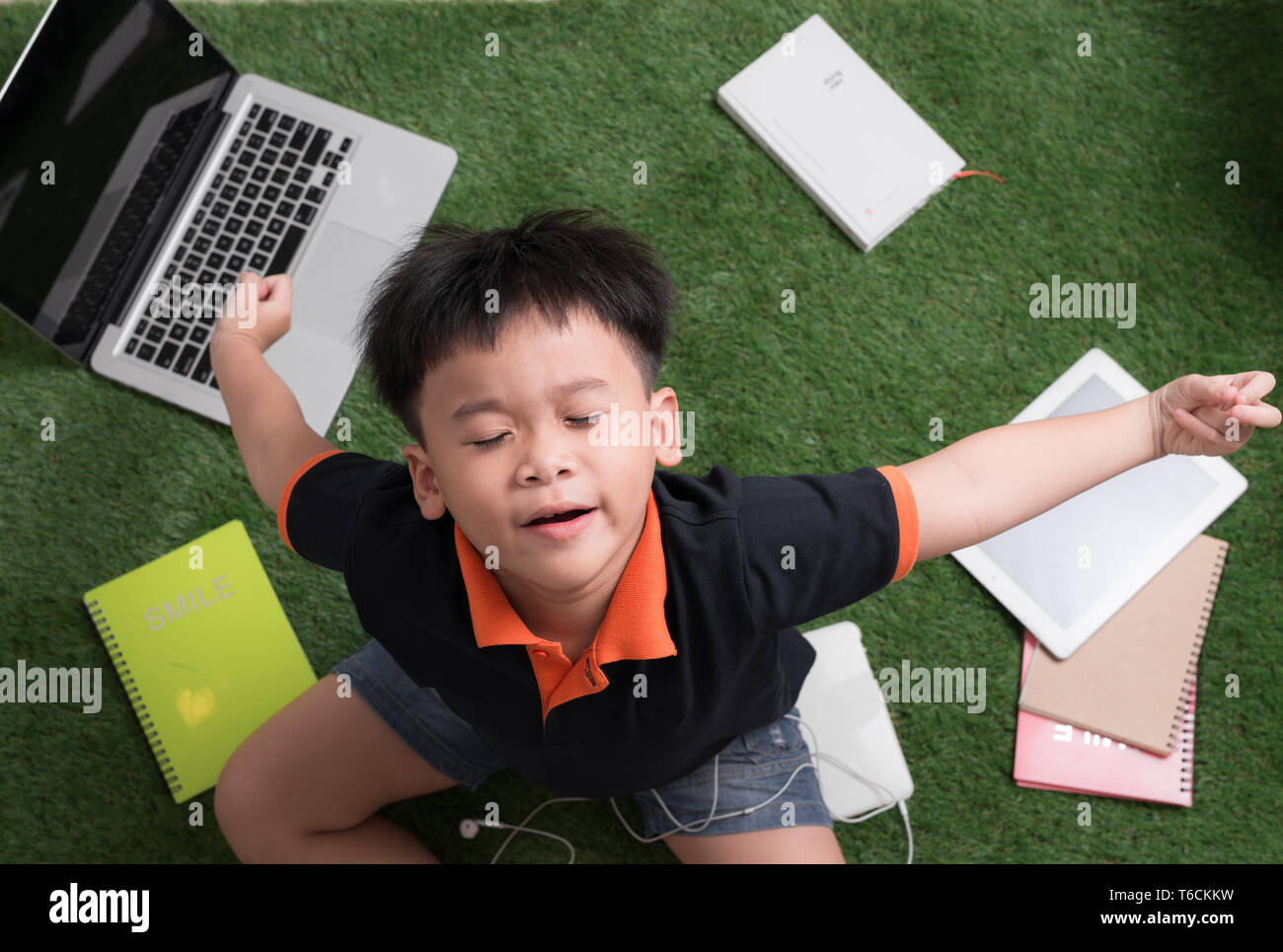 Waking little boy on nature Stock Photo - Alamy