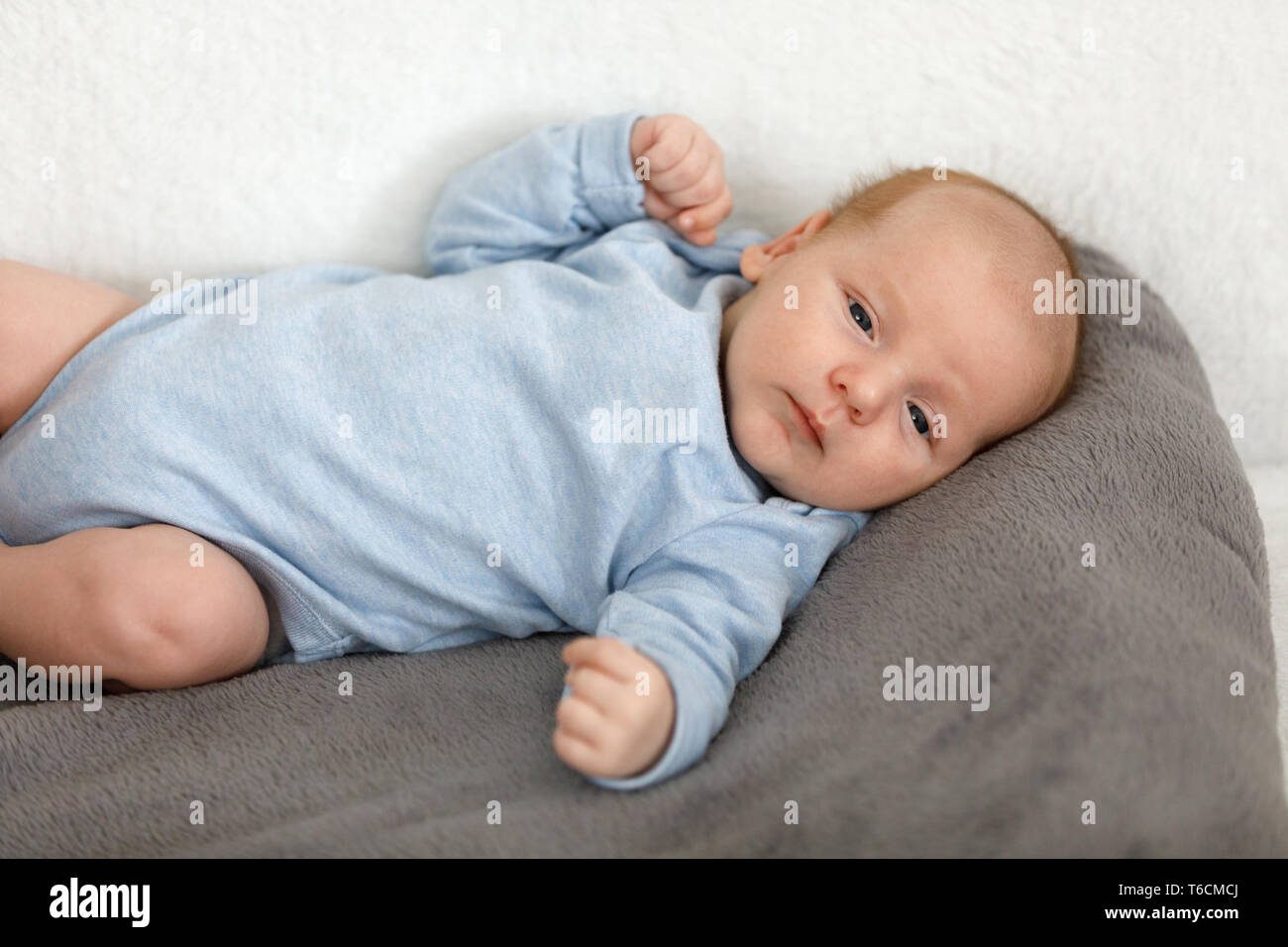 looking newborn baby Stock Photo - Alamy