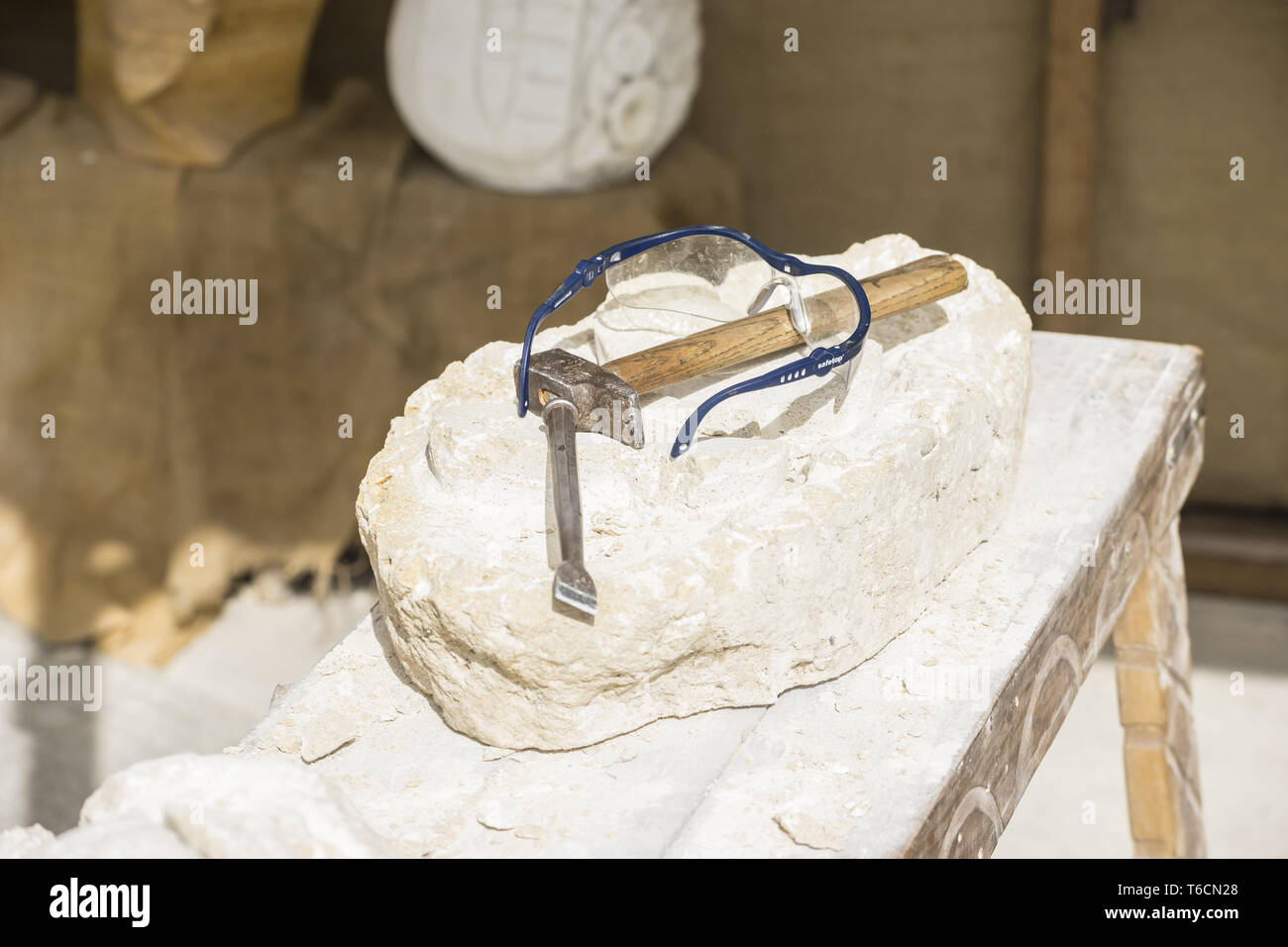 Carver, Traditional medieval sculpture tools in an old market in the ...