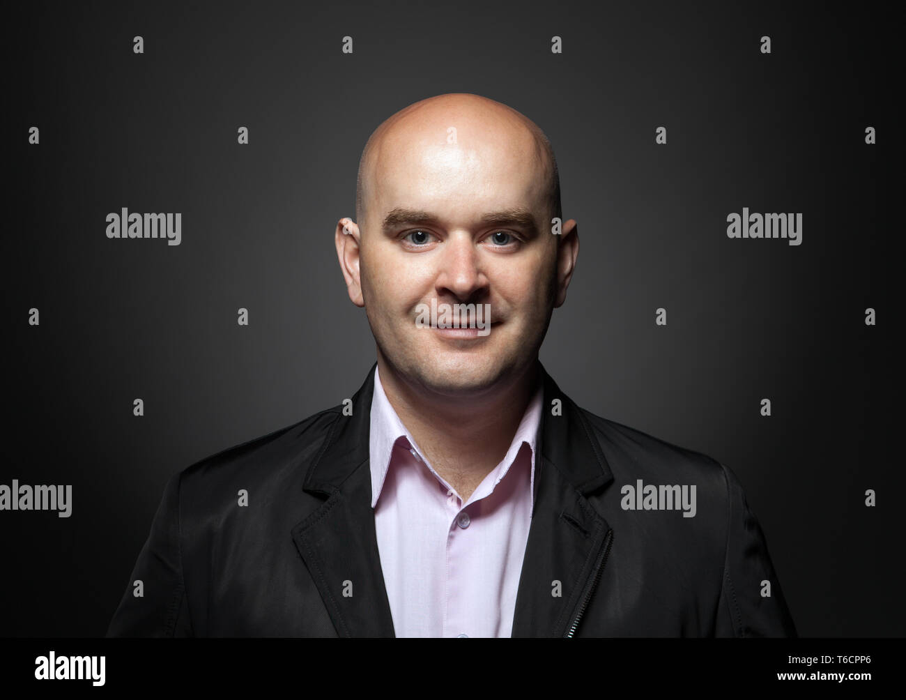 Bald headed man face serious hi-res stock photography and images - Alamy