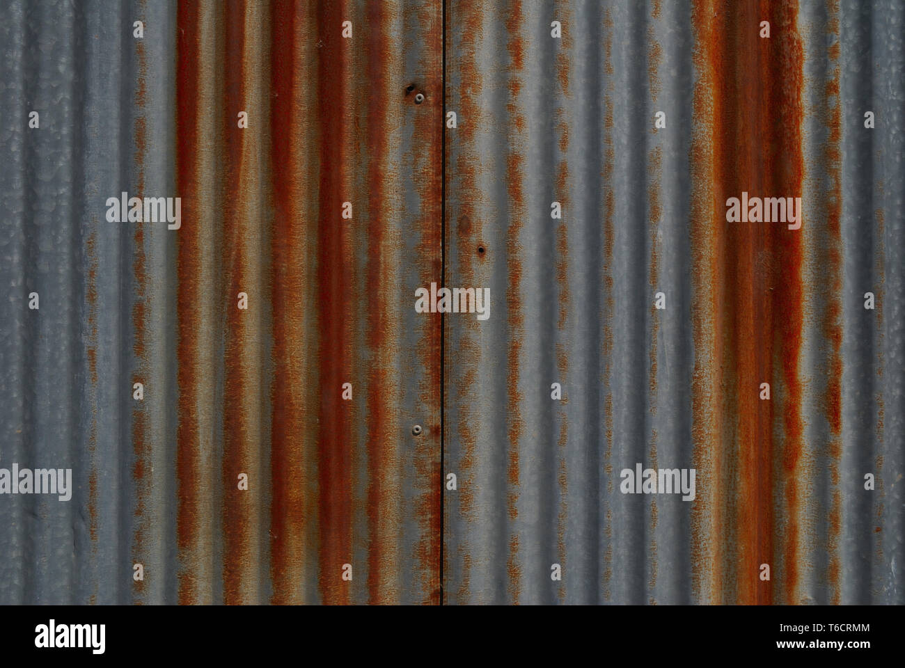 Galvanized surface that is rusty red Stock Photo - Alamy