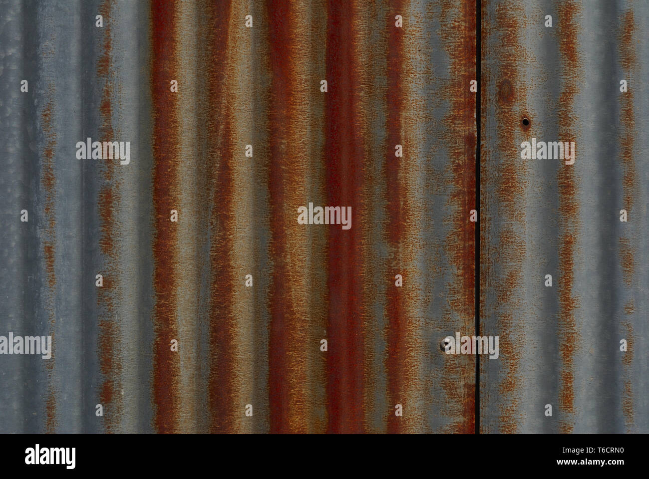 Galvanized surface that is rusty red Stock Photo - Alamy