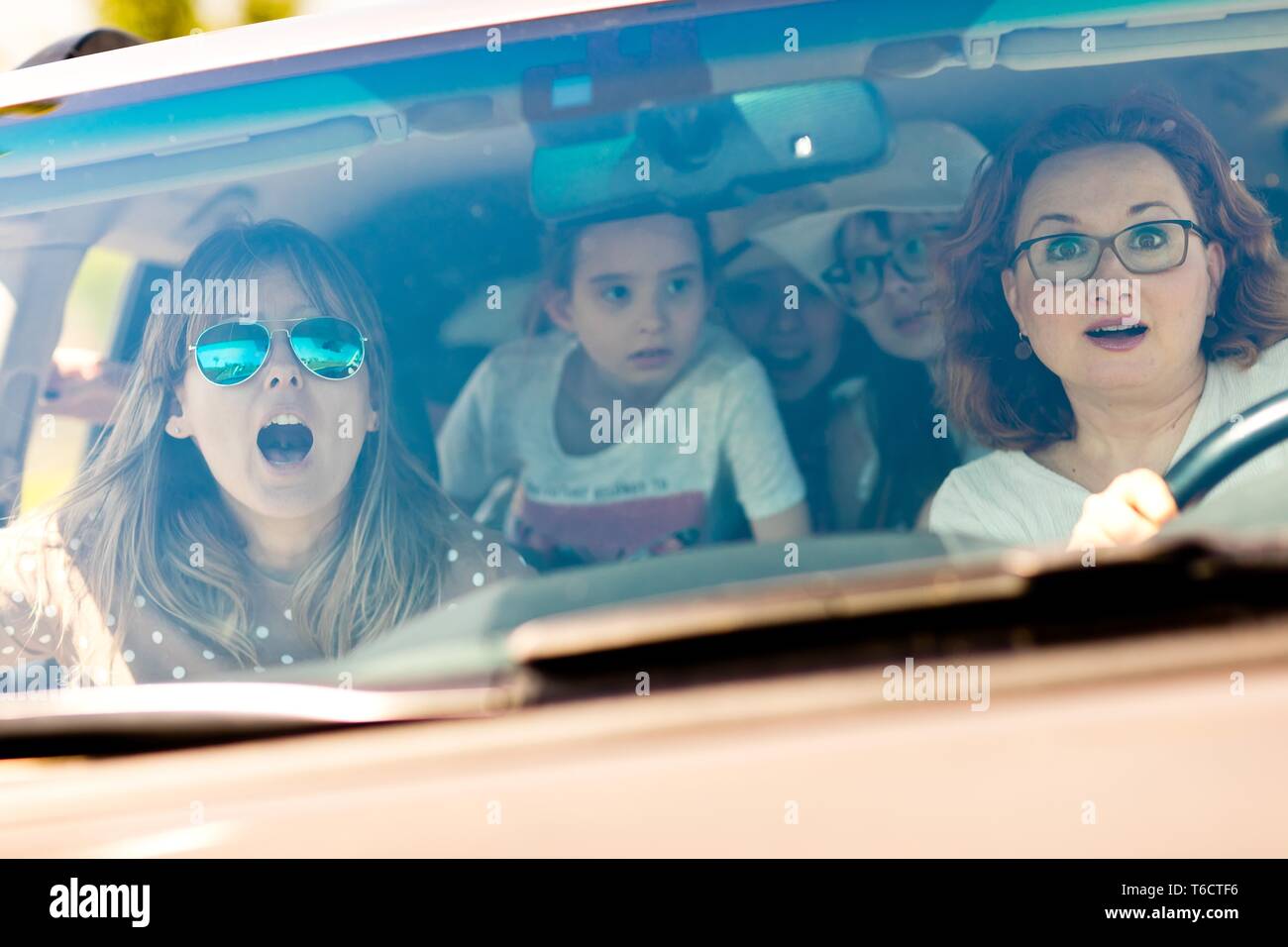 Mothers with daughters scared in car - frightened by incoming accident ...