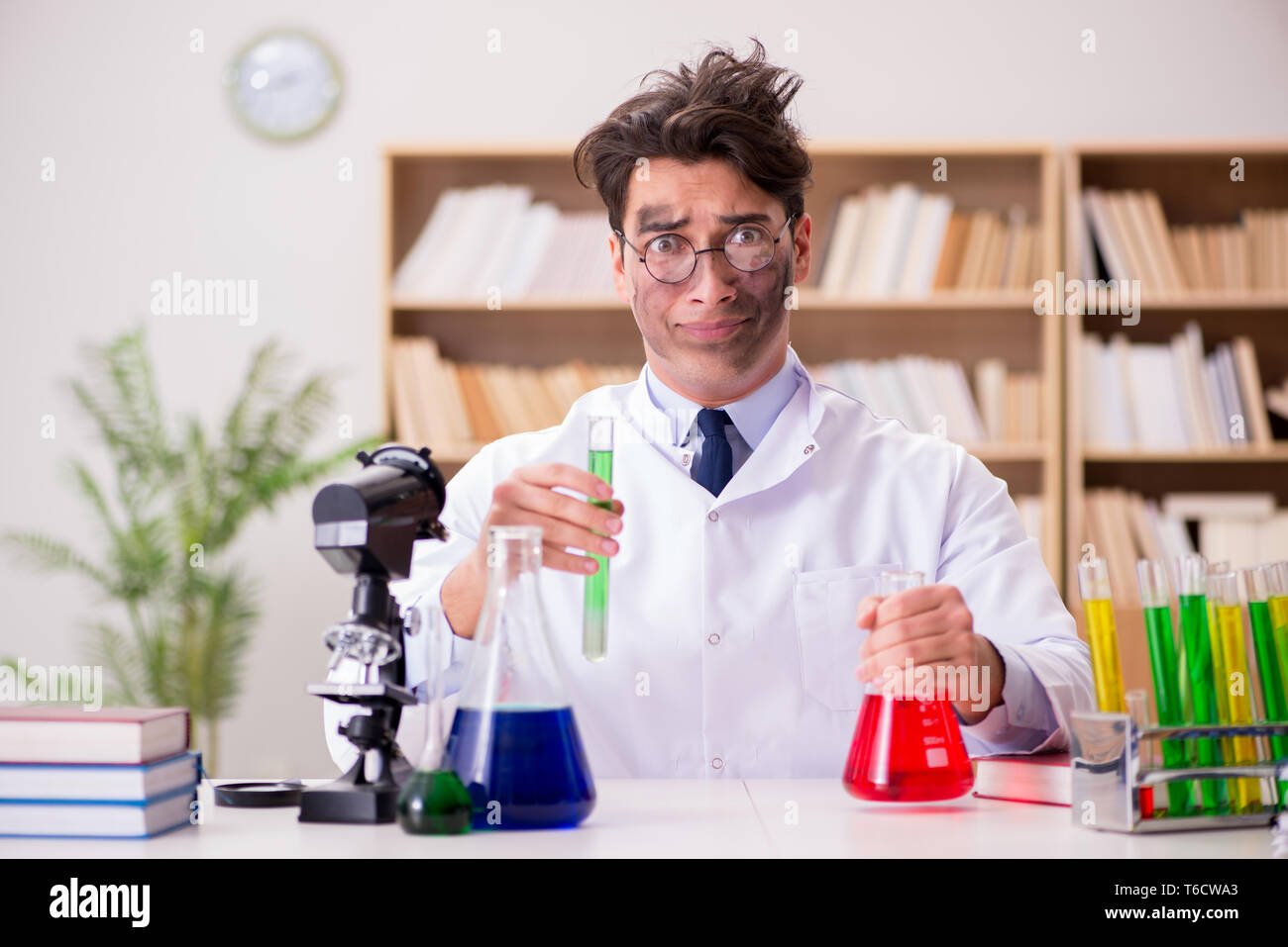 Mad crazy scientist doctor doing experiments in a laboratory Stock ...
