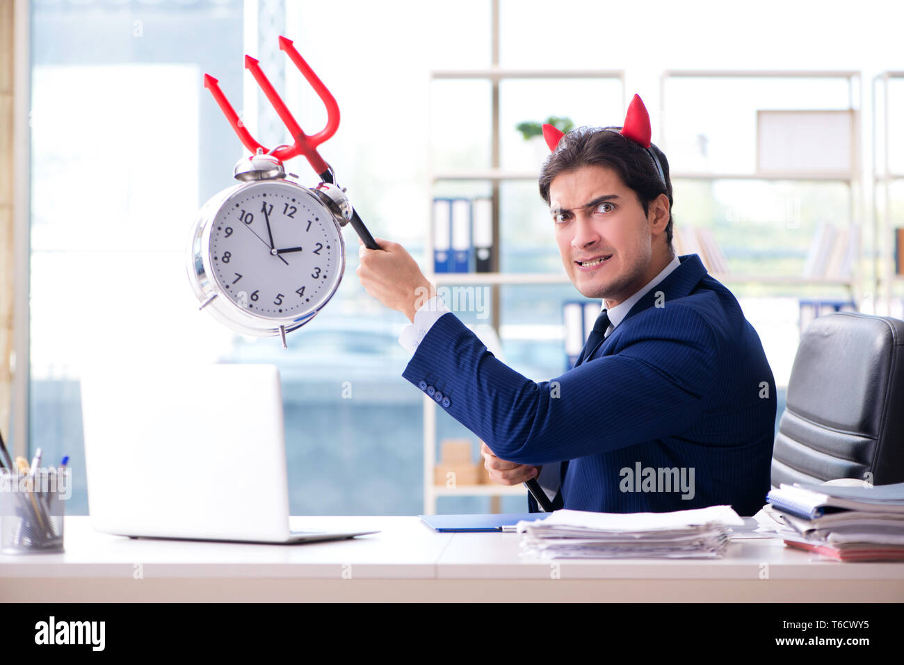 Devil angry businessman in the office Stock Photo - Alamy