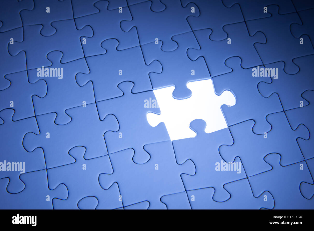 Blue jigsaw puzzle. Business solutions, solving problems,science ...