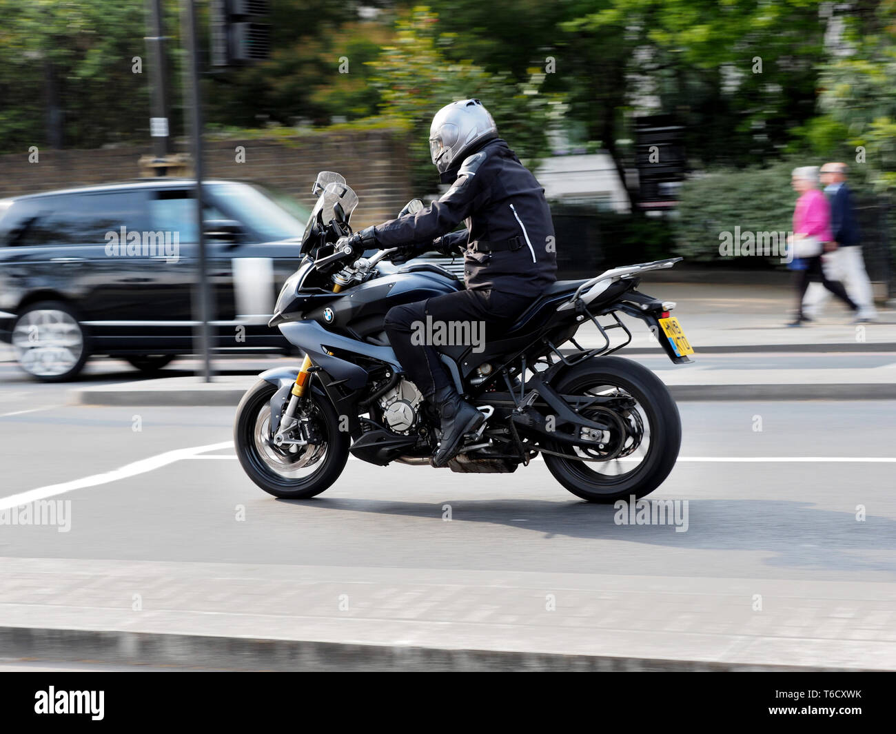 Commuting by Motorcycle in London, England, UK Stock Photo - Alamy