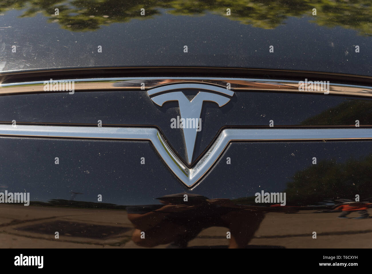 Black car hood cover with Tesla logo close-up Stock Photo - Alamy