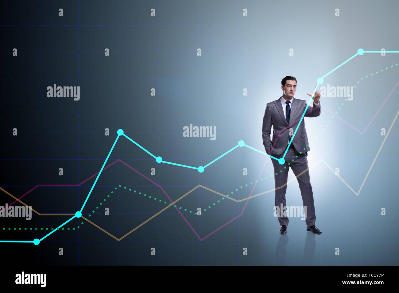 Business man next graph hi-res stock photography and images - Alamy