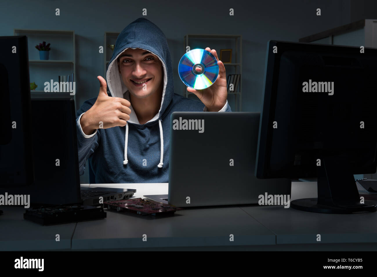 Hacker hacking computer at night Stock Photo - Alamy