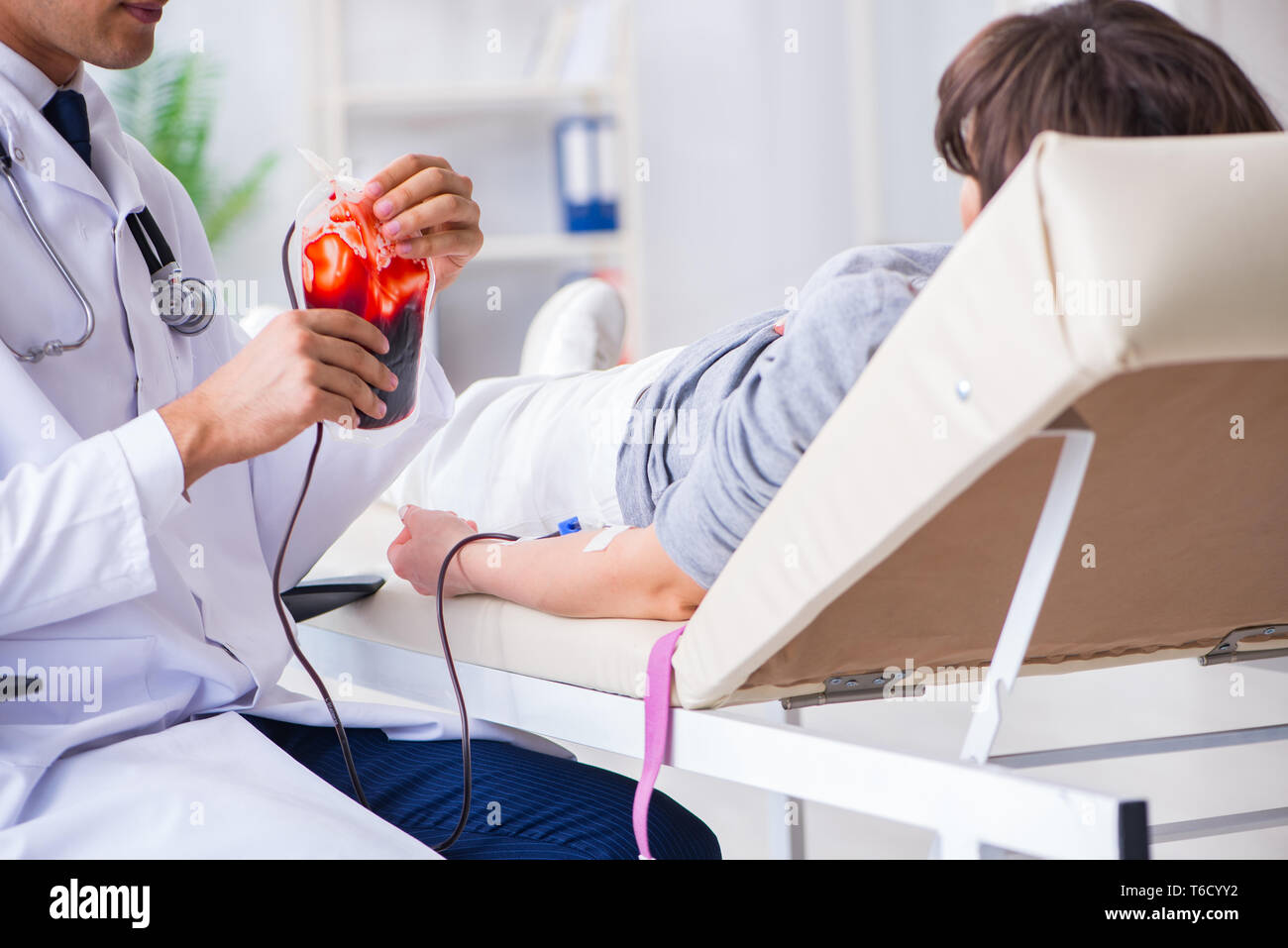 Patient getting blood transfusion in hospital clinic Stock Photo - Alamy
