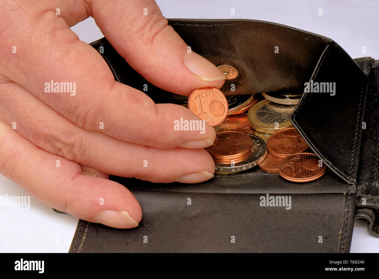 wallet with coins Stock Photo - Alamy