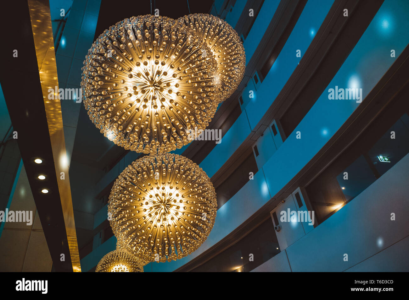 Light feature indoors in a hotel's inner void Stock Photo - Alamy
