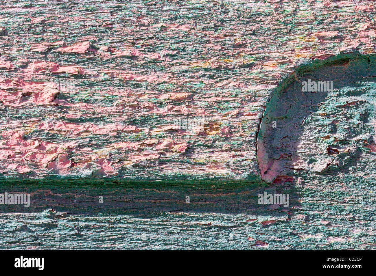 Close-of the old wooden surface all with cracked old purple, turquoise ...