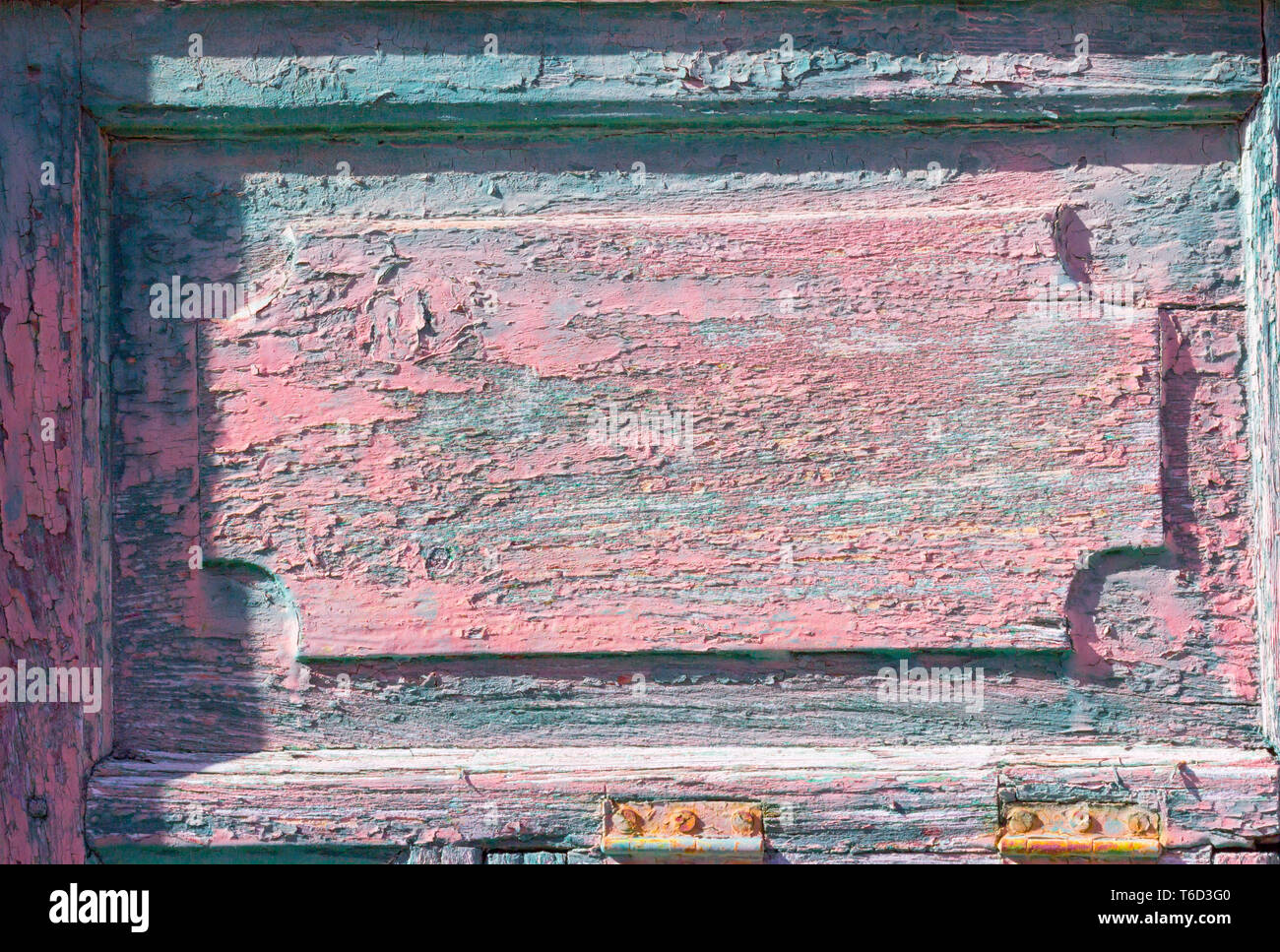 Close-of the old wooden surface all with cracked old purple, turquoise ...