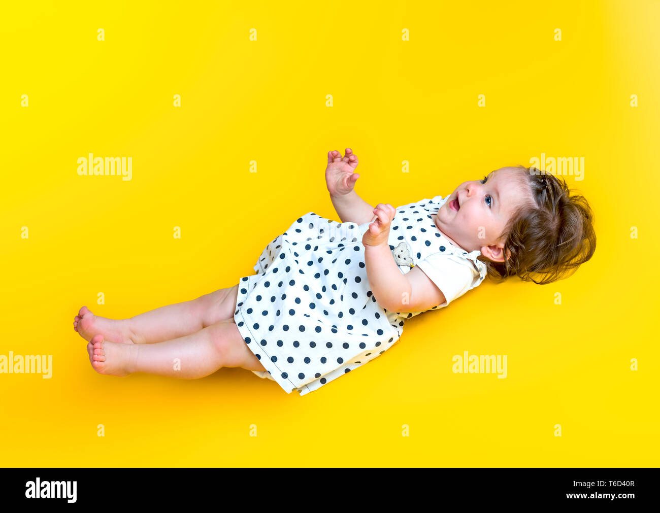 Smiling happy 8 months old baby girl Stock Photo - Alamy