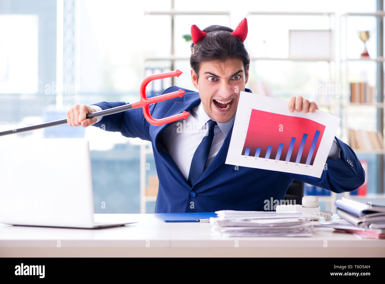 Devil angry businessman in the office Stock Photo - Alamy