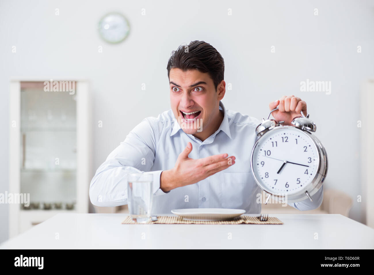 Angry man waiting food in hi-res stock photography and images - Alamy