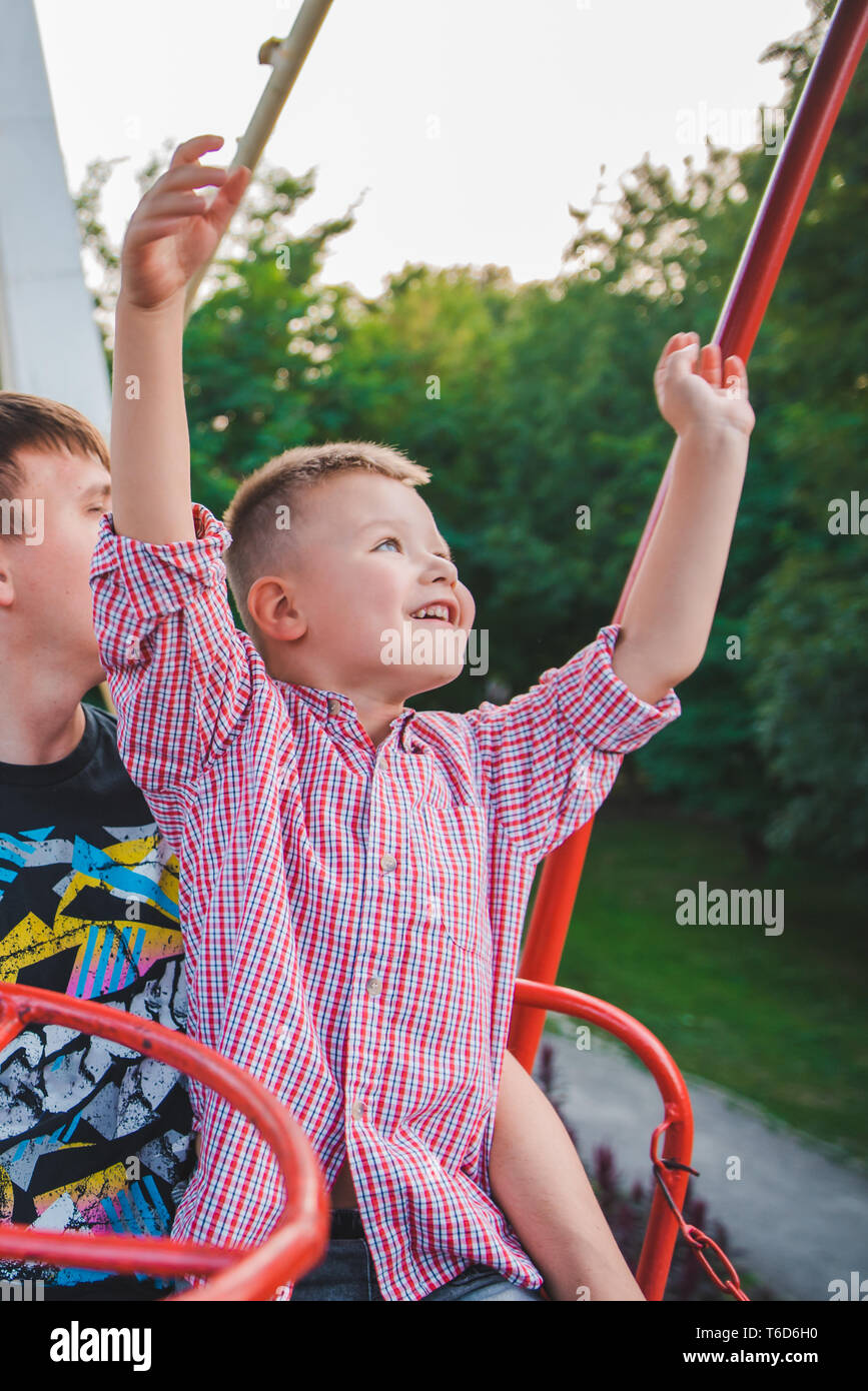 Kid girl ferris wheel riding hi-res stock photography and images - Alamy