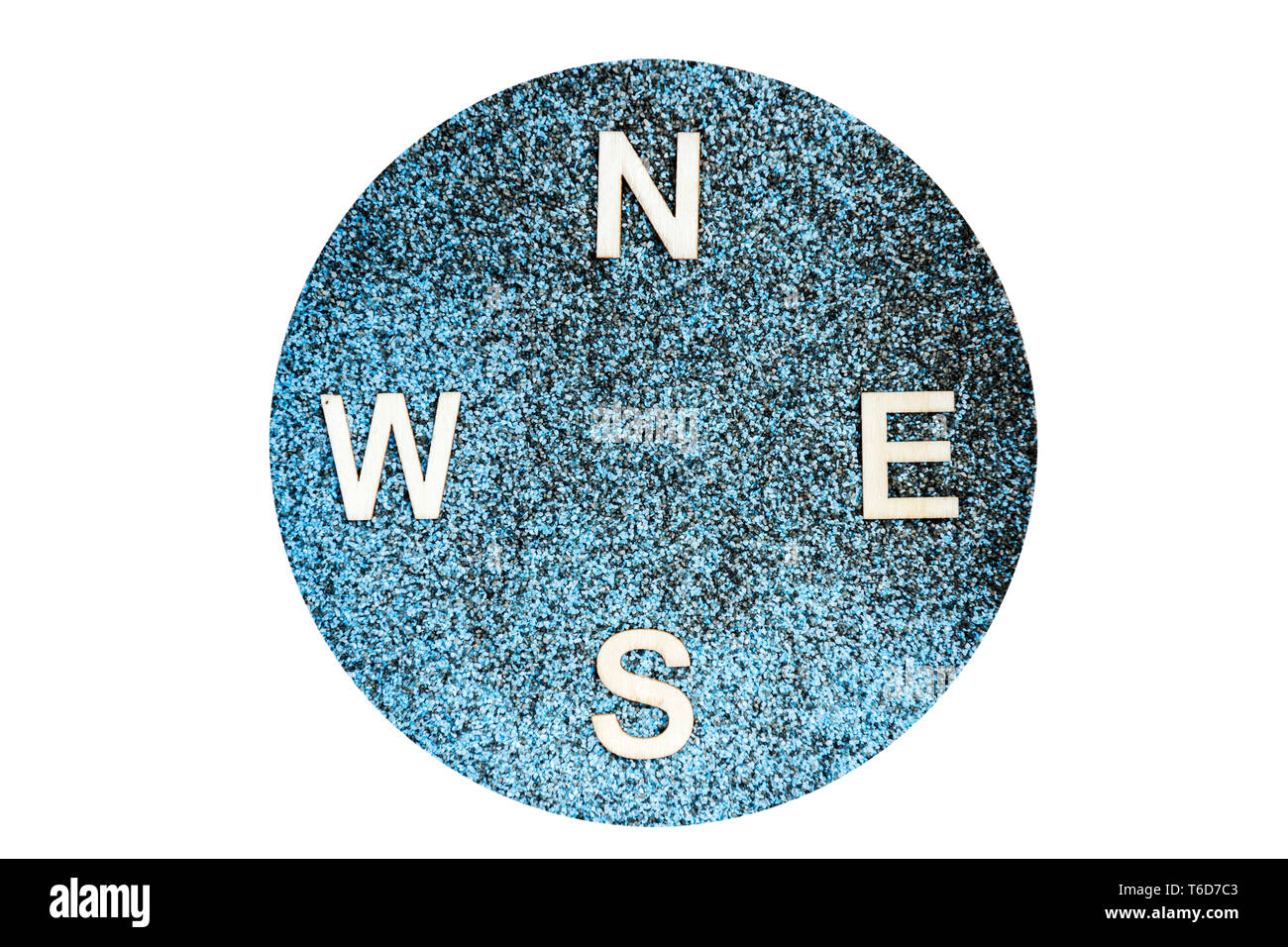 Mixed black and blue decorative sand with applied wooden letters of the ...