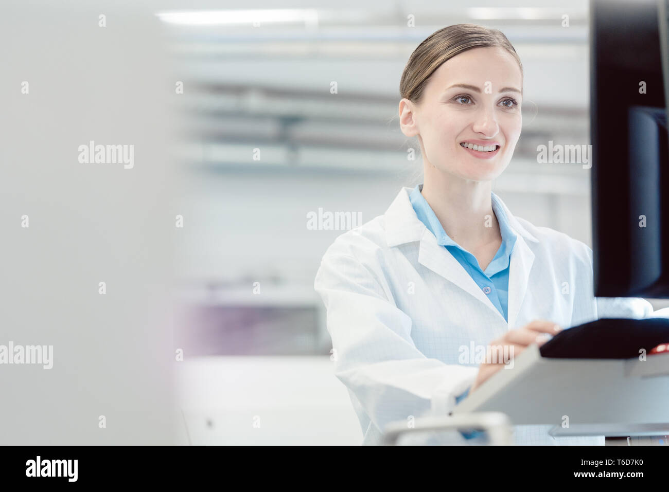 Engineer operating manufacturing line in electronics factory Stock ...