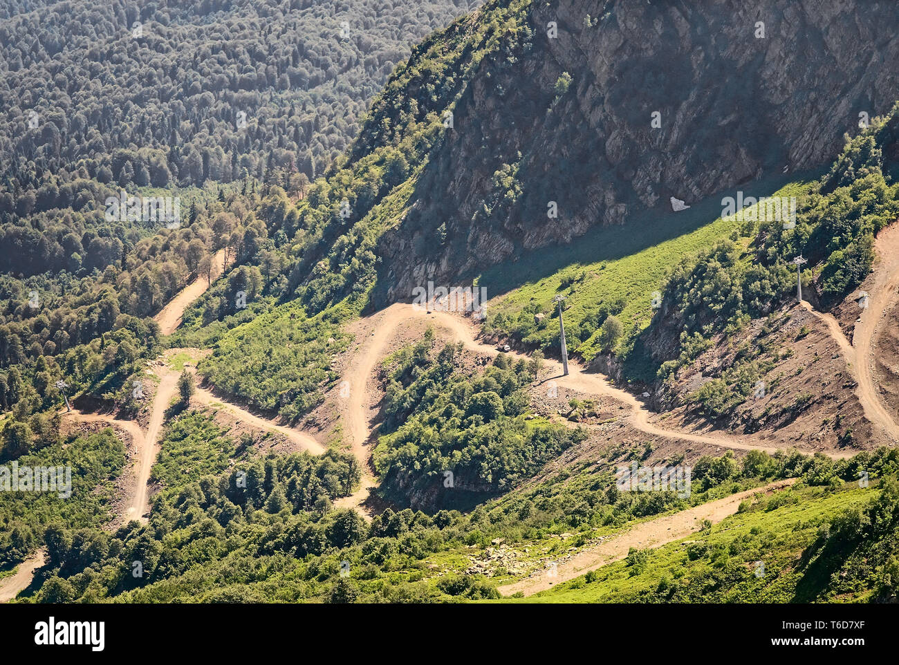 Mountain landscape: a winding road on the mountainside Stock Photo - Alamy