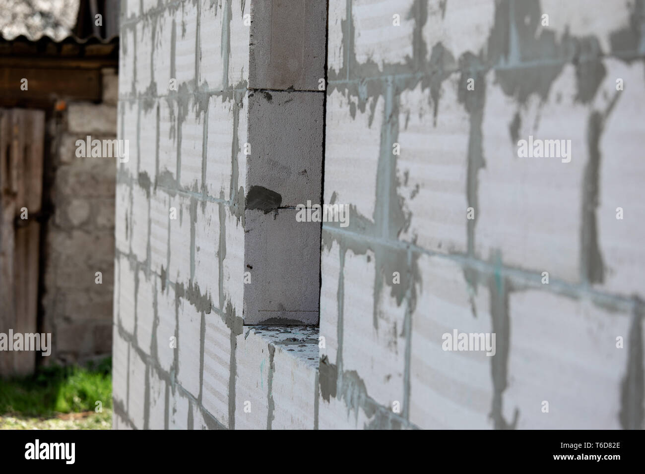 Masonry or bricklaying work. The concrete blocks for wall in the ...