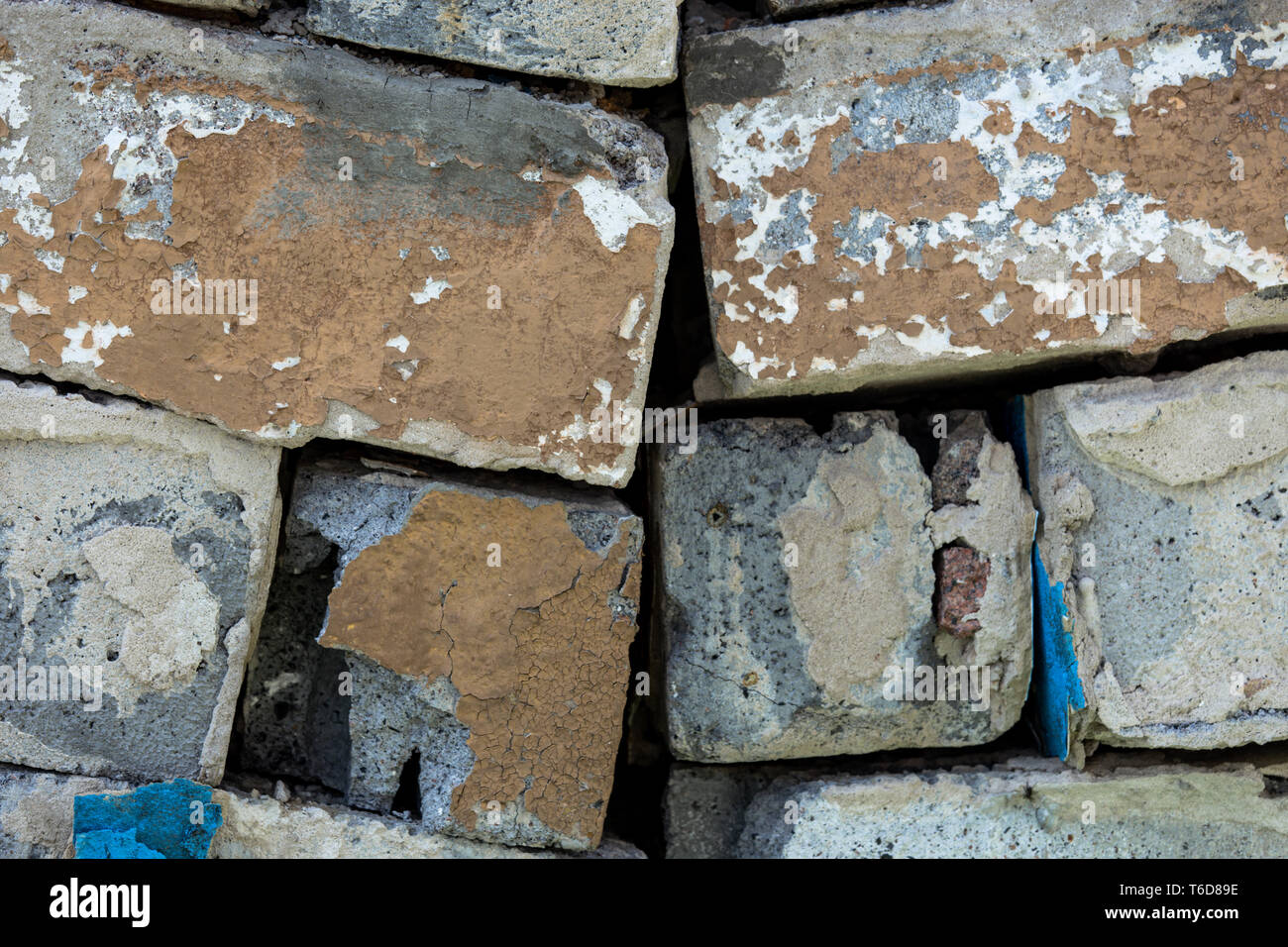 Background and texture of old broken painted cement building blocks ...