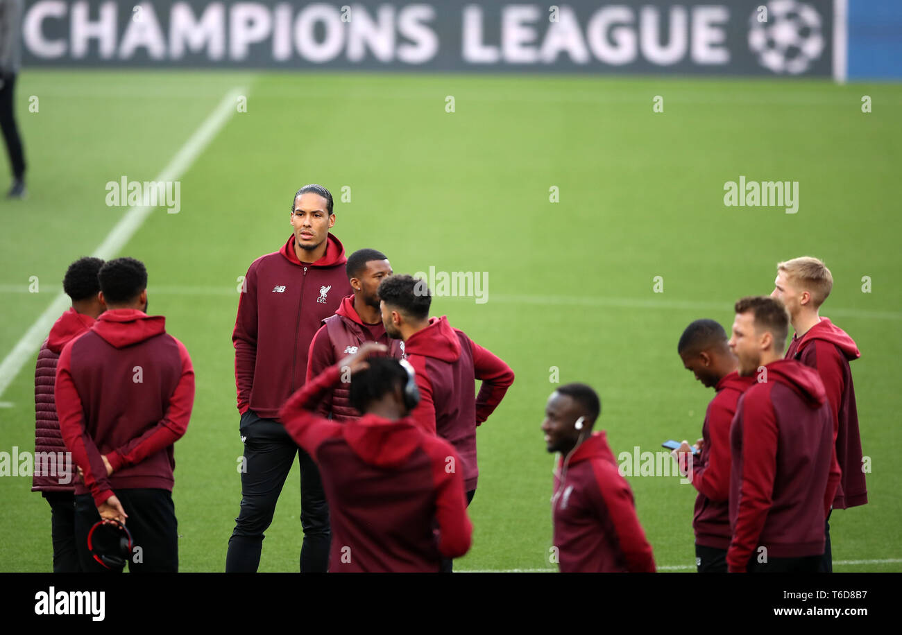 Liverpool's Virgil van Dijk and team-mates on the pitch before during ...