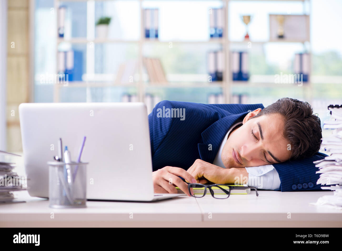 Tired businessman exhausted after hard work and excessive worklo Stock ...
