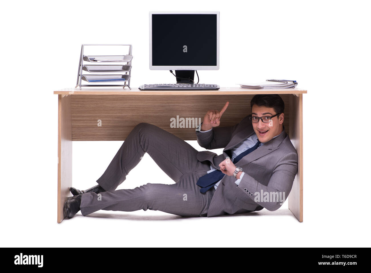 Person hiding under desk hi-res stock photography and images - Alamy