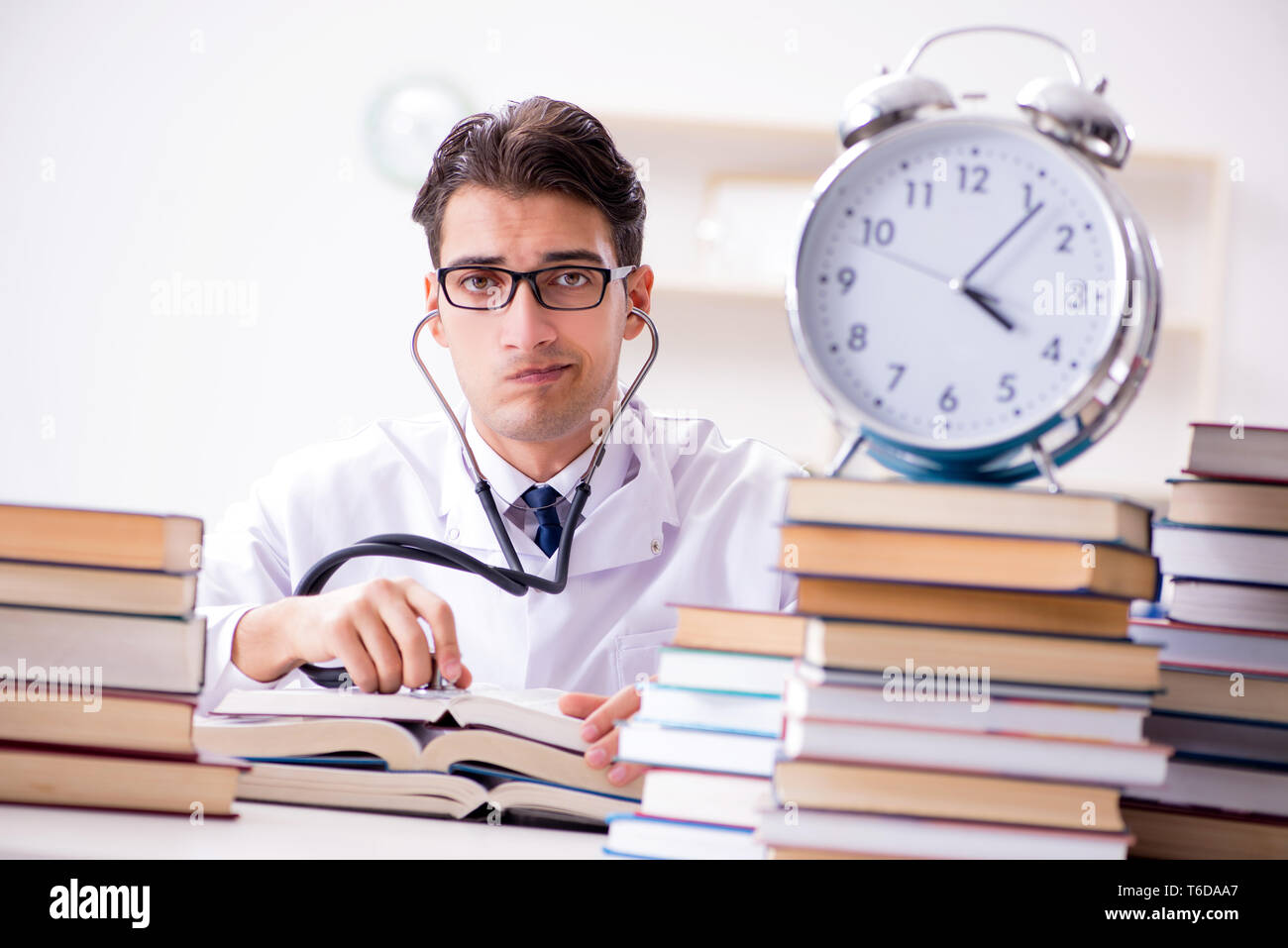 Medical student running out of time for exams Stock Photo - Alamy