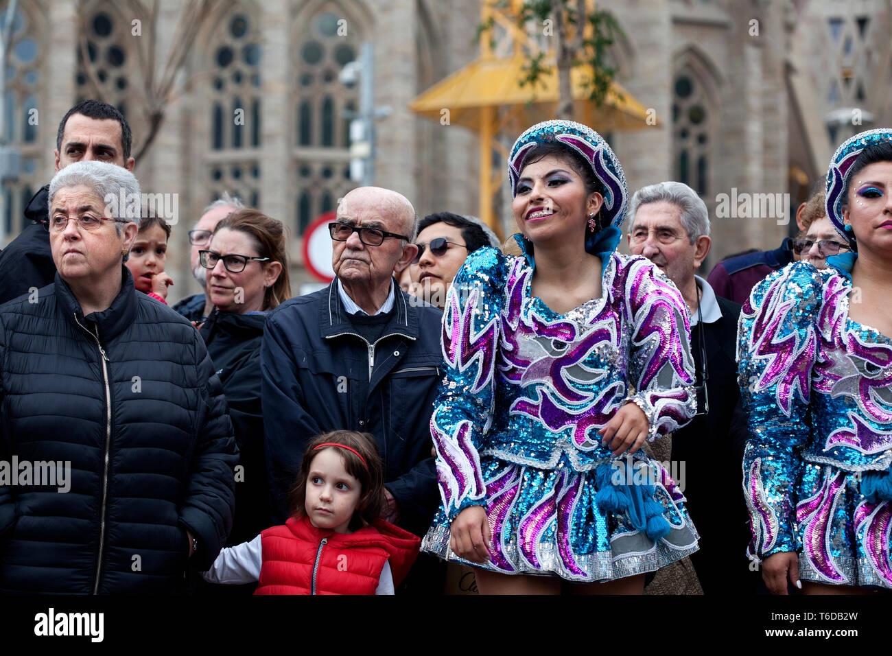 Onlookers and dancers at S.American procession, Barcelona, Spain Stock ...