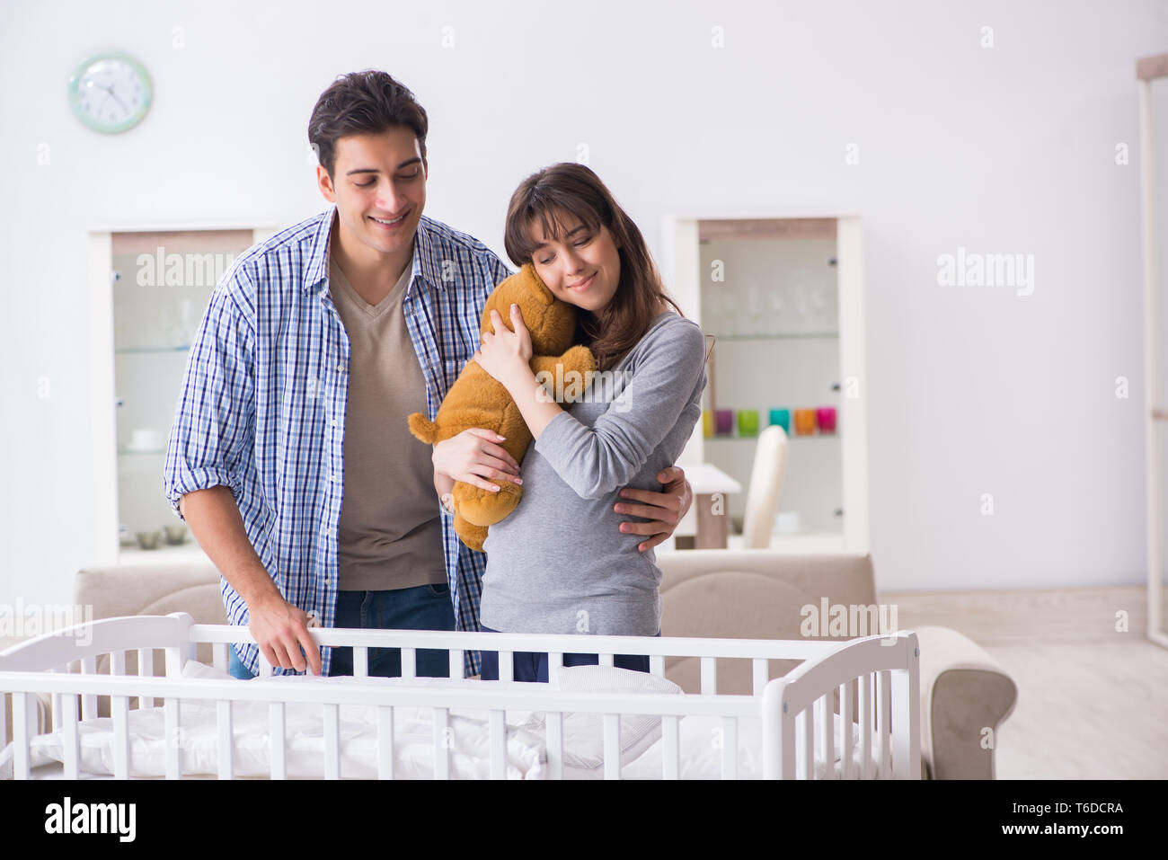 Smiling parents cute little hi-res stock photography and images - Alamy