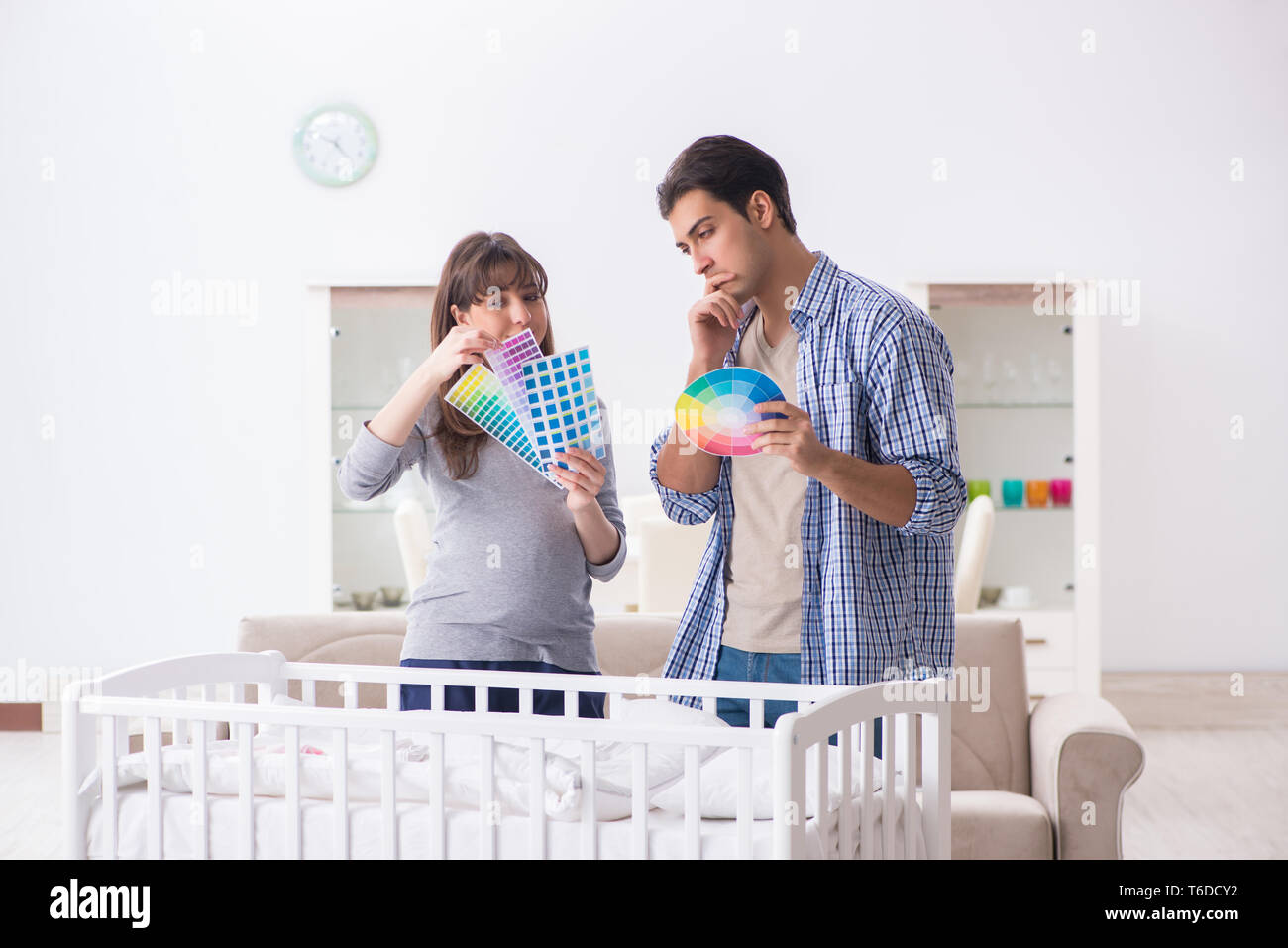 Dad mom infant bed sleeping hi-res stock photography and images - Alamy